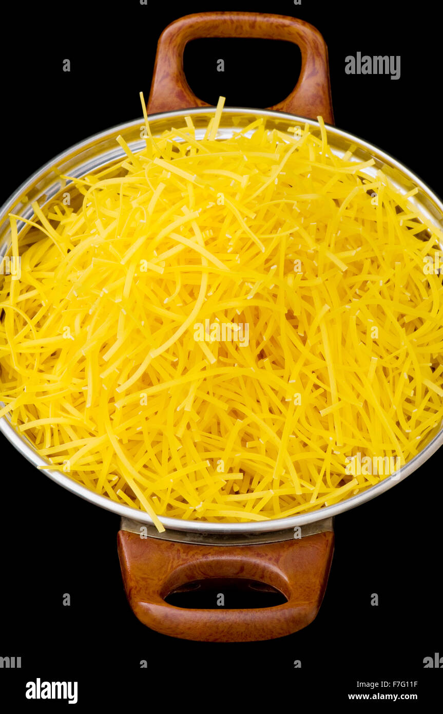 Spaghetti pot isolated on the black background Stock Photo - Alamy