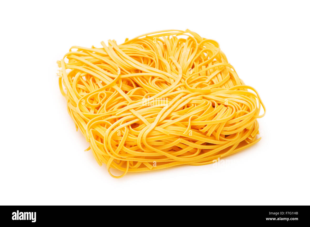 Stack of spaghetti isolated on the white Stock Photo - Alamy