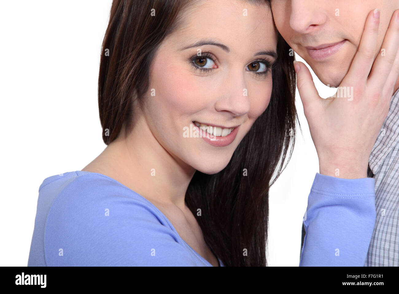 Woman caressing a man's face Stock Photo - Alamy
