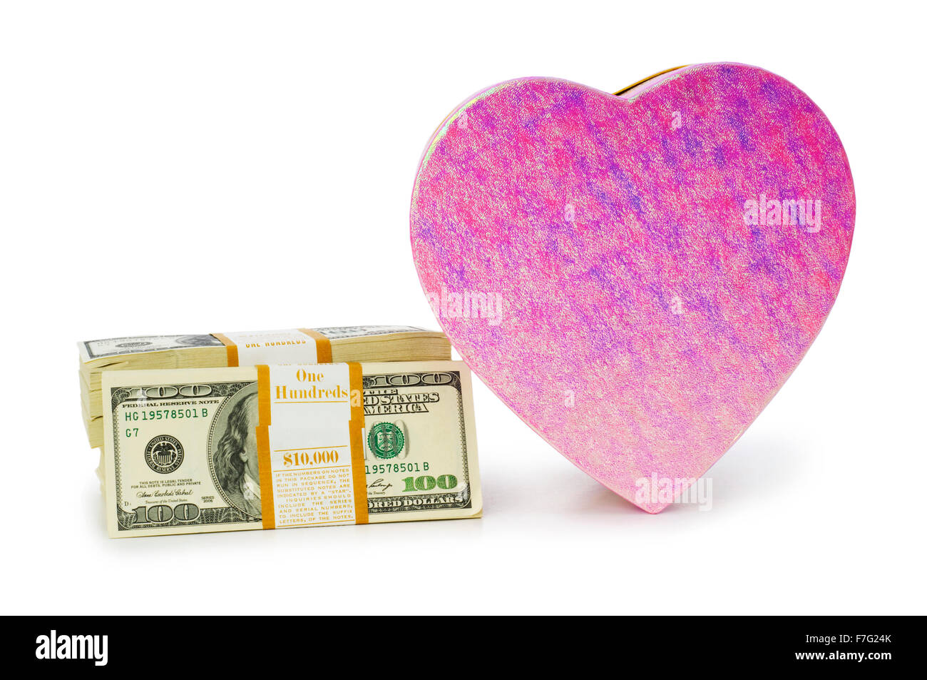 Heart shaped gift box and dollars Stock Photo - Alamy