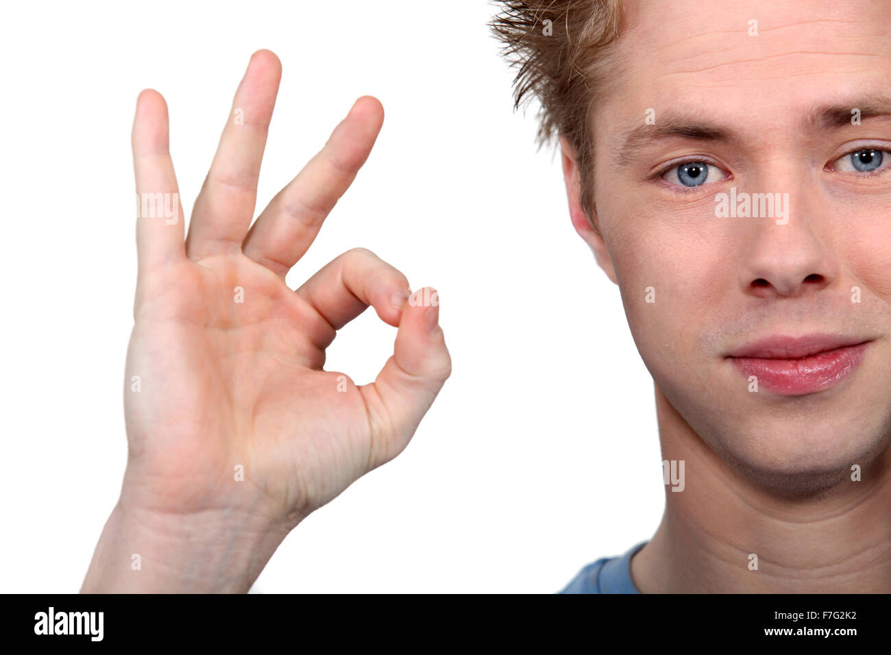 Teenager giving the OK Stock Photo - Alamy