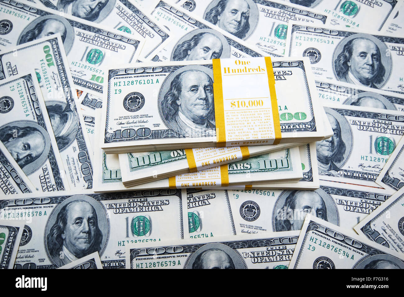 Stack of dollars on money background Stock Photo - Alamy