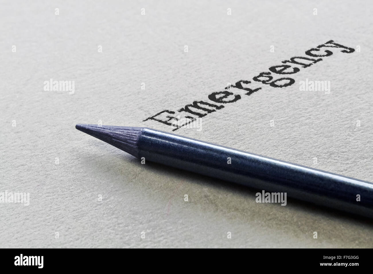 Graphite pencil and handwritten word Emergency Stock Photo - Alamy