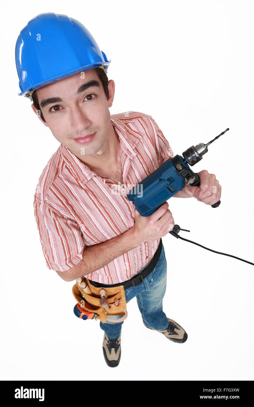 Young man with a power drill Stock Photo - Alamy