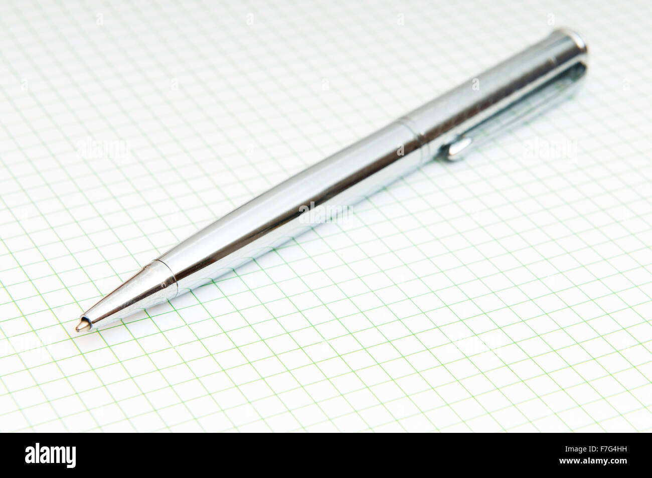 Writing pen on the blank page Stock Photo - Alamy