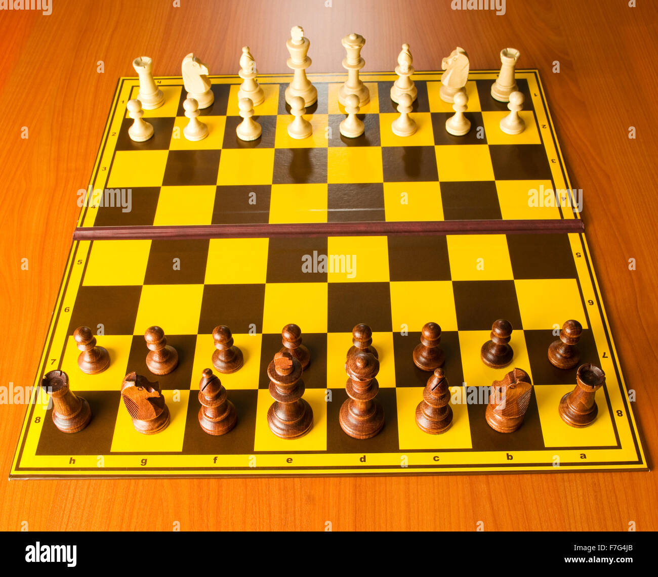 Set of chess figures on the playing board Stock Photo - Alamy
