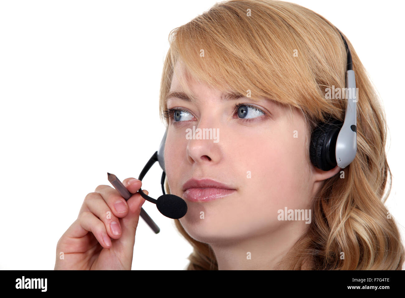 Attentive call-center worker Stock Photo - Alamy