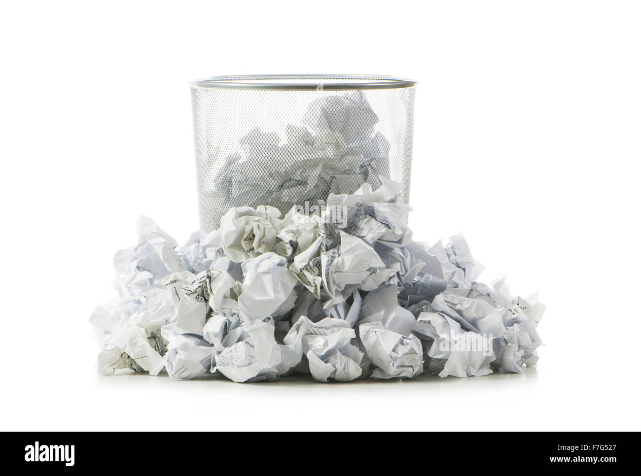 Garbage bin with paper waste isolated on white Stock Photo - Alamy