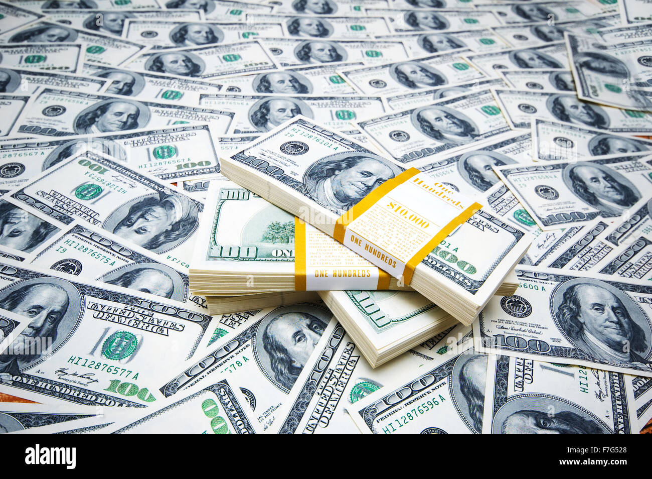 Stack of dollars on money background Stock Photo - Alamy