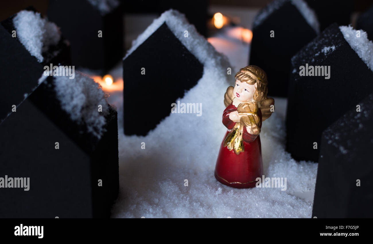 angel in snow Stock Photo - Alamy