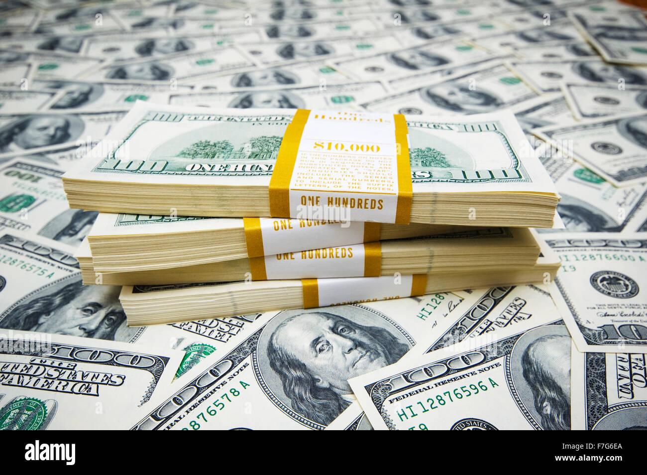 Stack of dollars on money background Stock Photo - Alamy