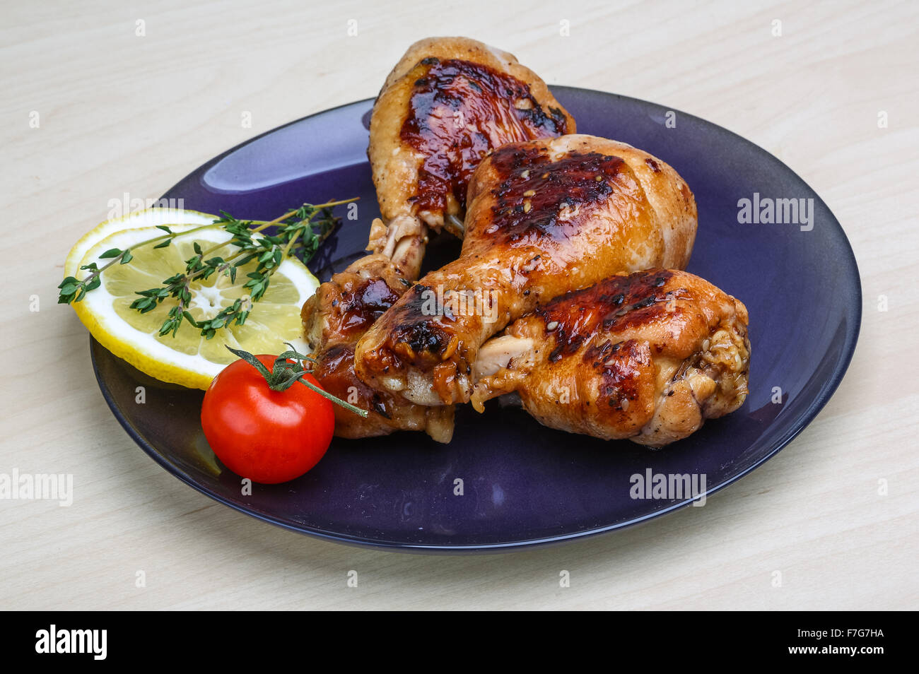 Roasted chicken legs in teriyaki sause with thyme Stock Photo - Alamy