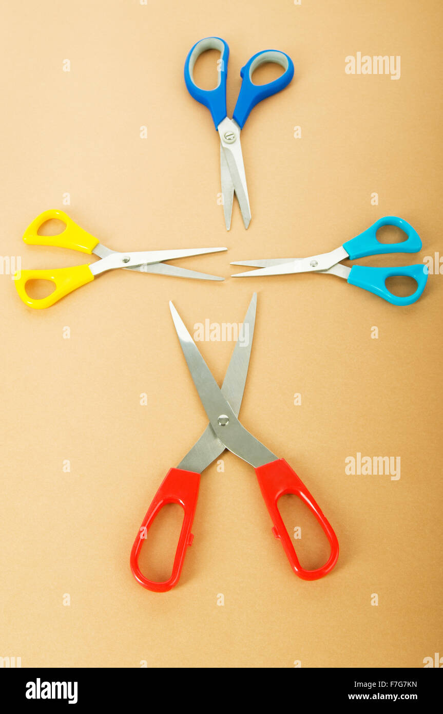 Colorful scissors on the color paper background Stock Photo - Alamy