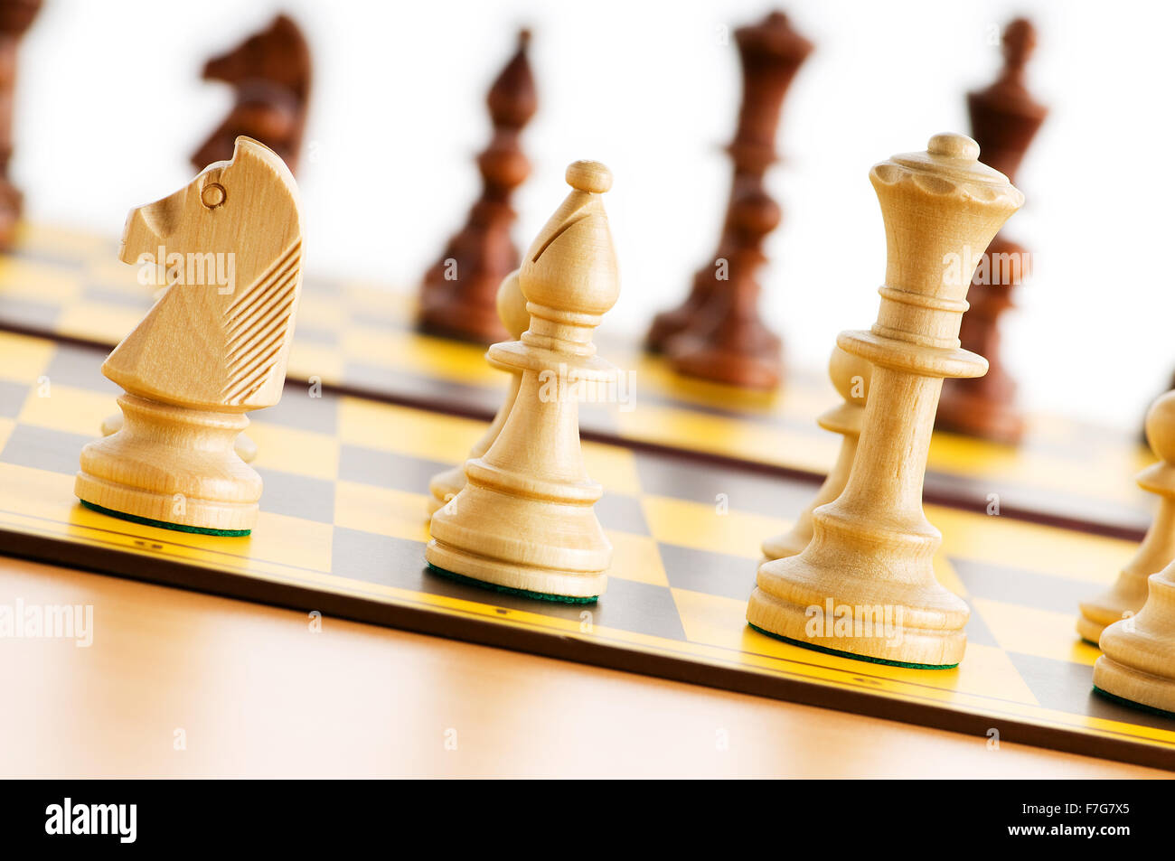 Set of chess figures on the playing board Stock Photo - Alamy