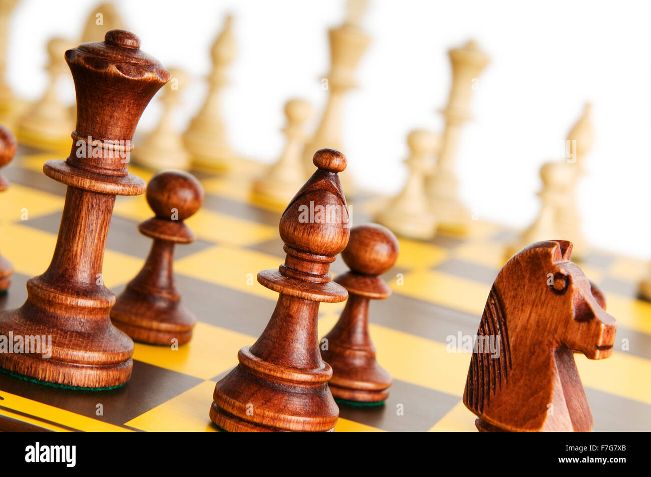 Set of chess figures on the playing board Stock Photo - Alamy