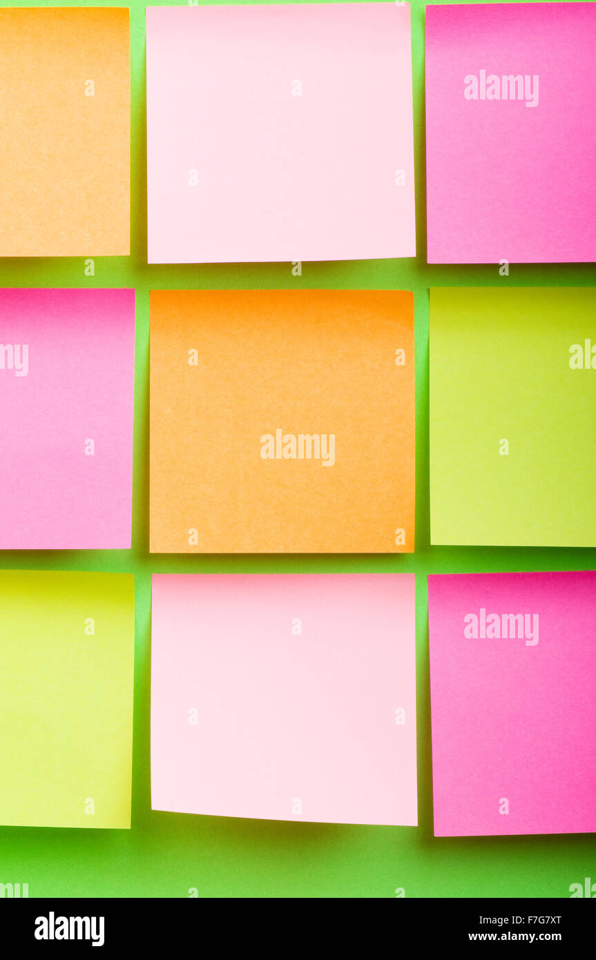 Reminder notes on the bright colorful paper Stock Photo - Alamy