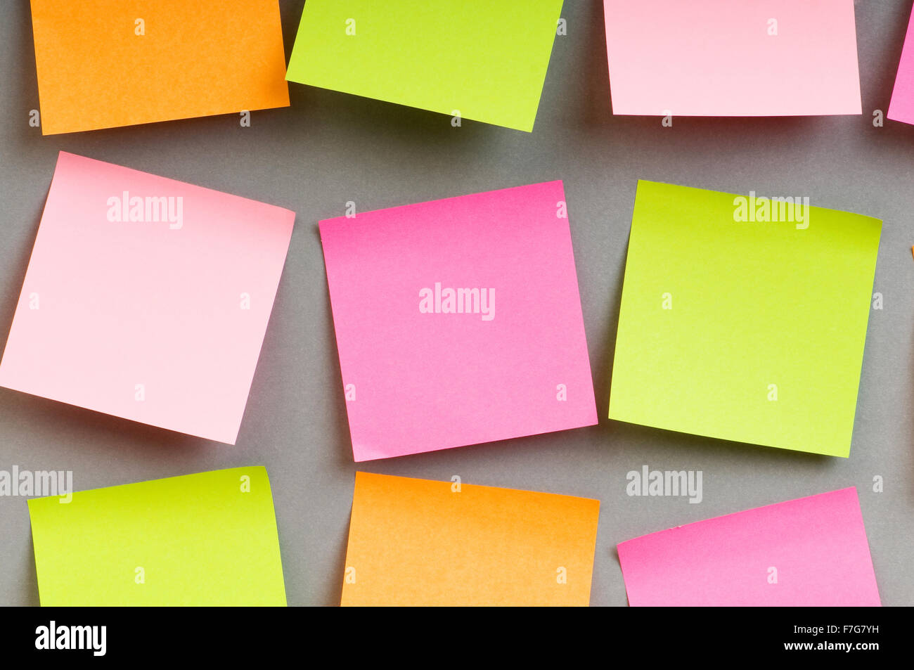 Reminder notes on the bright colorful paper Stock Photo - Alamy