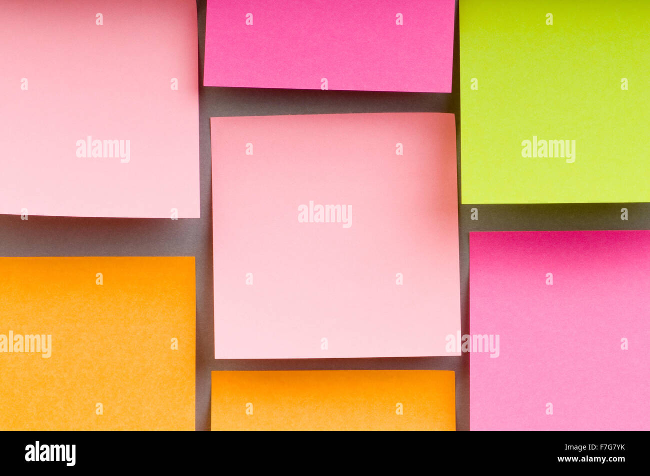 Reminder notes on the bright colorful paper Stock Photo - Alamy