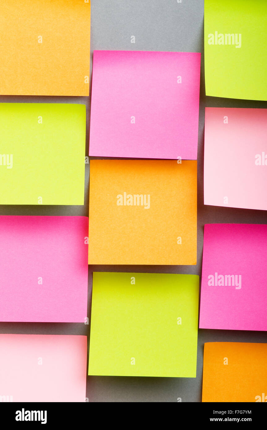 Reminder notes on the bright colorful paper Stock Photo - Alamy