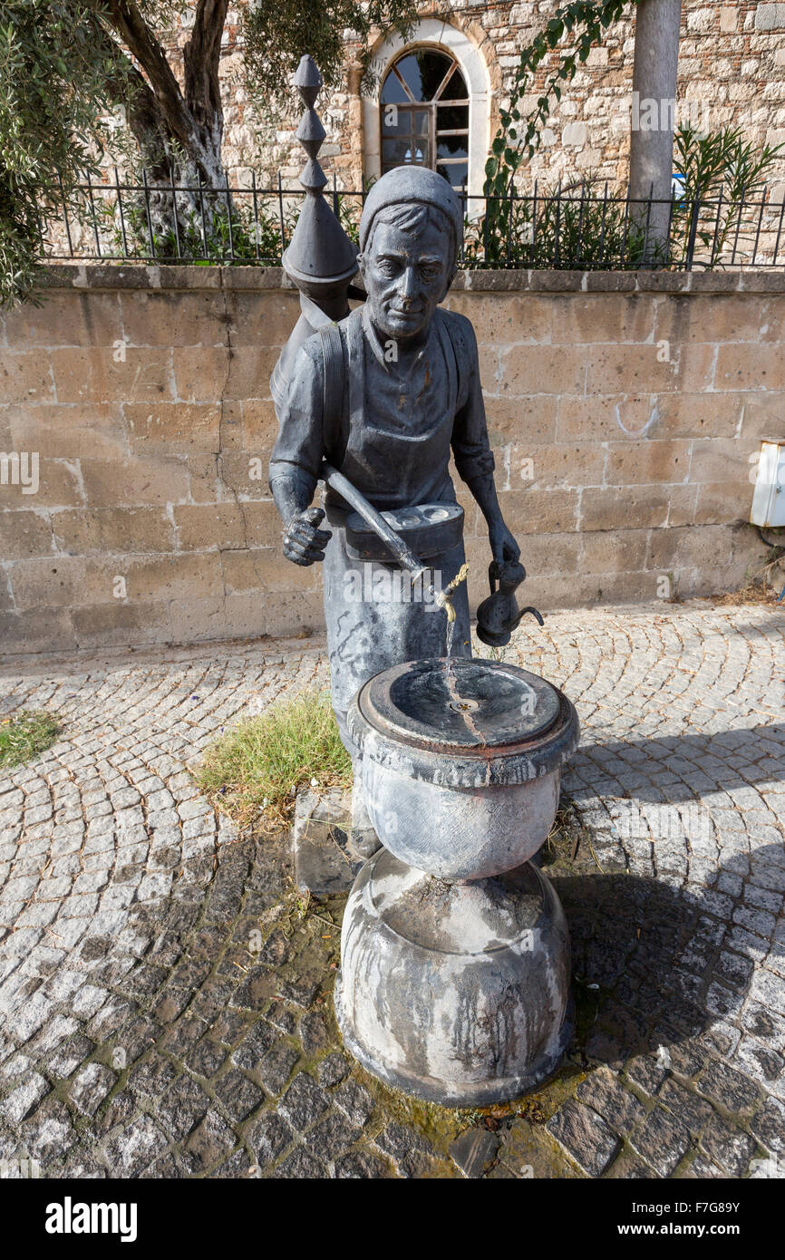 Water fountain depicting a traditional Turkish tea man in Didyma Stock ...