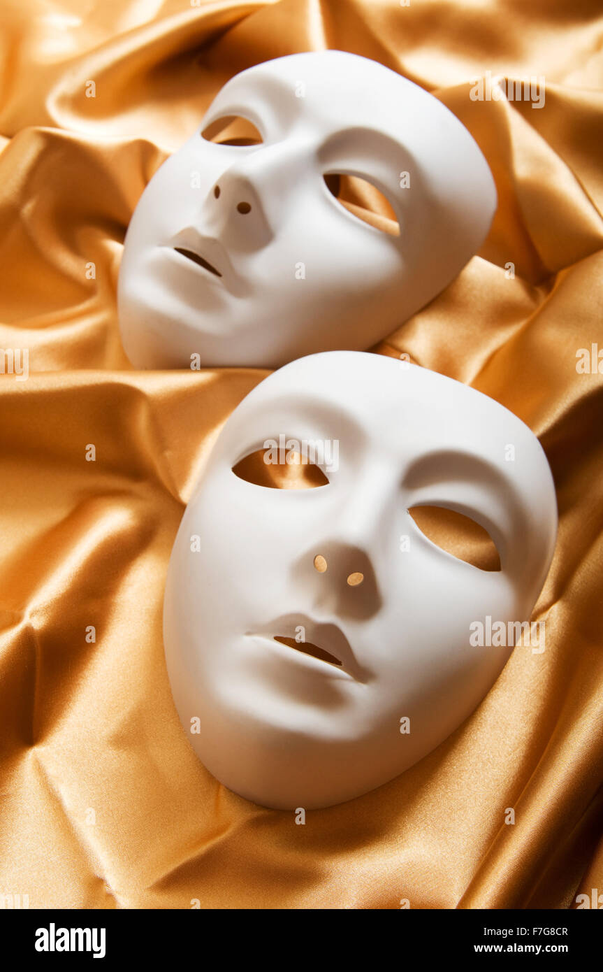 Theatre concept with the white plastic masks Stock Photo - Alamy