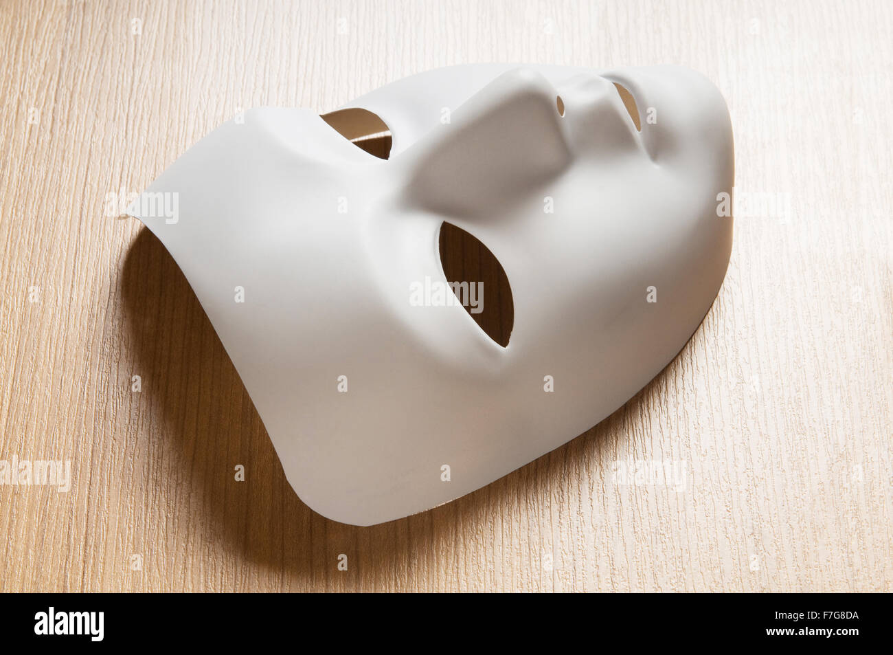 Theatre concept with the white plastic masks Stock Photo - Alamy