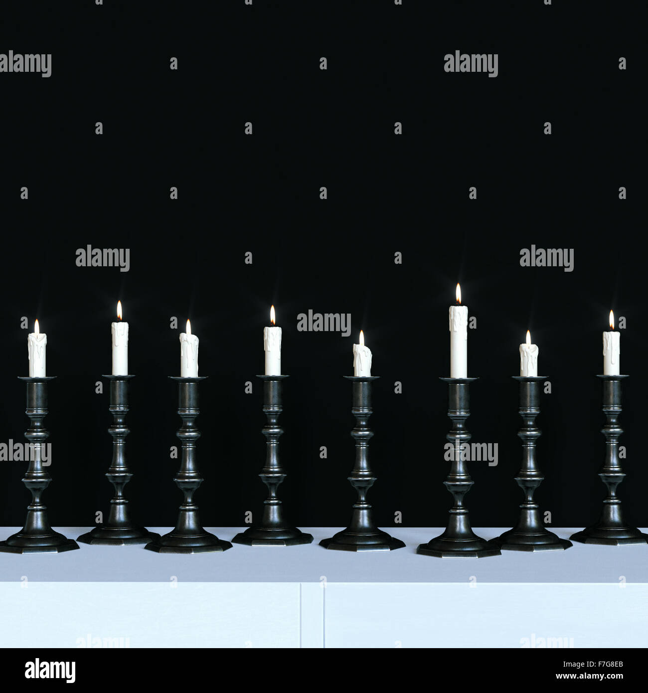 Burning candles in a vintage black metal candlesticks. 3d render Stock ...