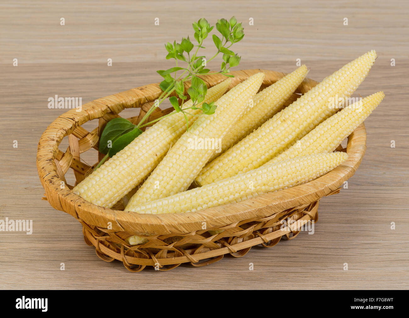 Fresh ripe Baby corn on the wood background Stock Photo - Alamy