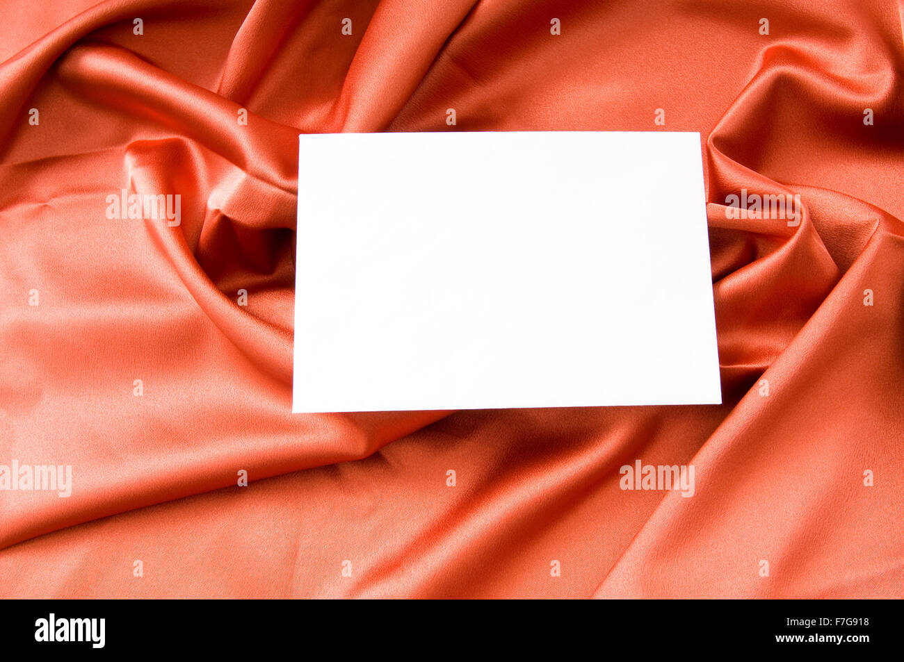 Blank message on the red satin background Stock Photo - Alamy
