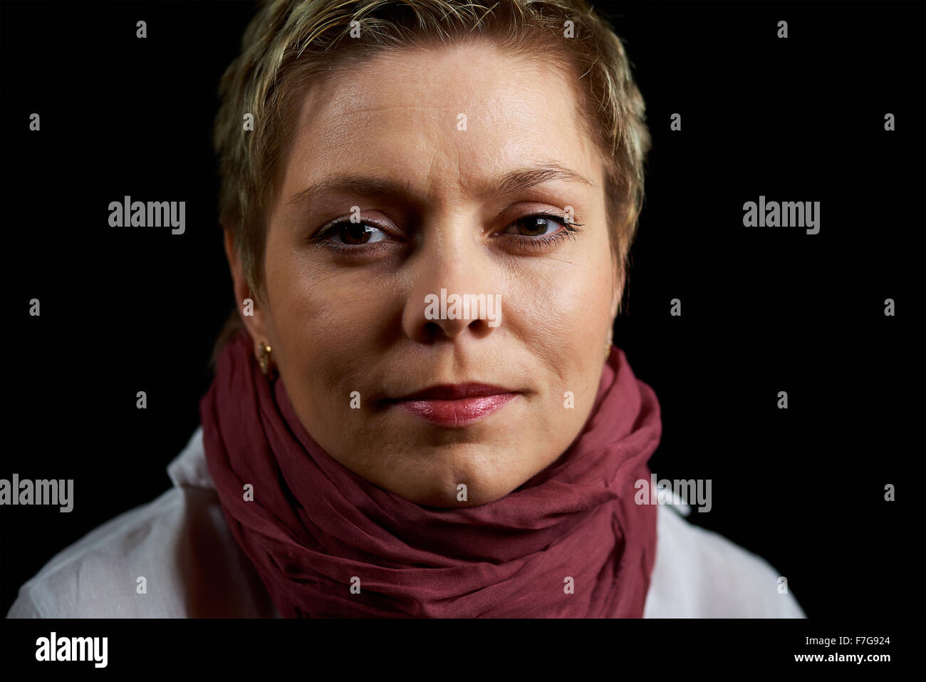 Pretty woman portrait over black. Low key Stock Photo - Alamy