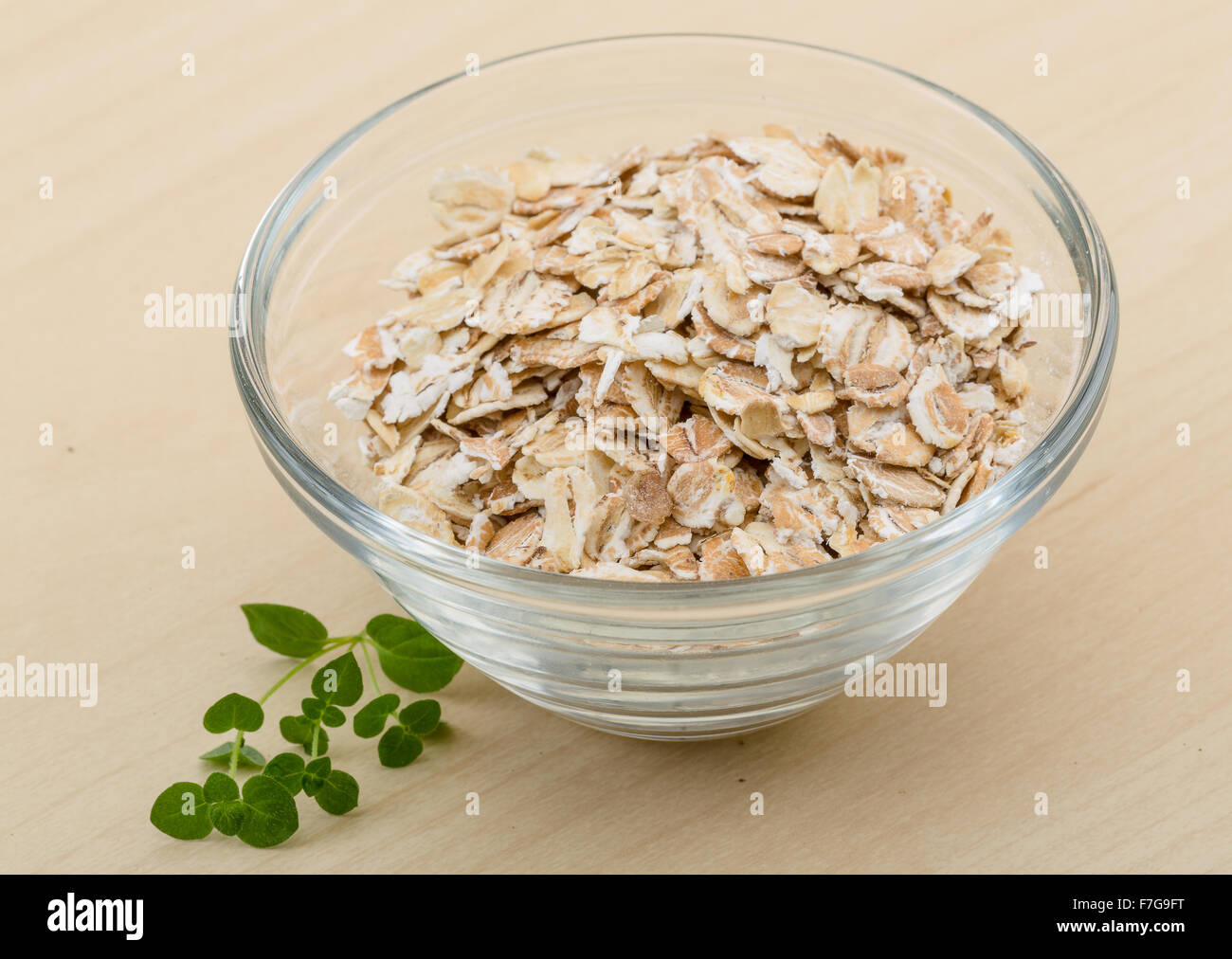 Dry oats pile in the glass bowl Stock Photo - Alamy