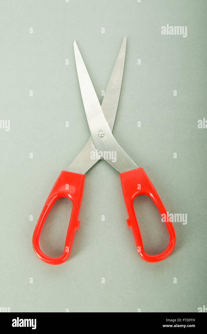 Colorful scissors on the color paper background Stock Photo - Alamy