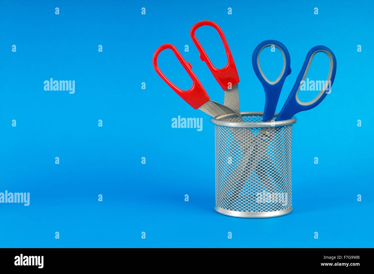 Colorful scissors on the color paper background Stock Photo - Alamy