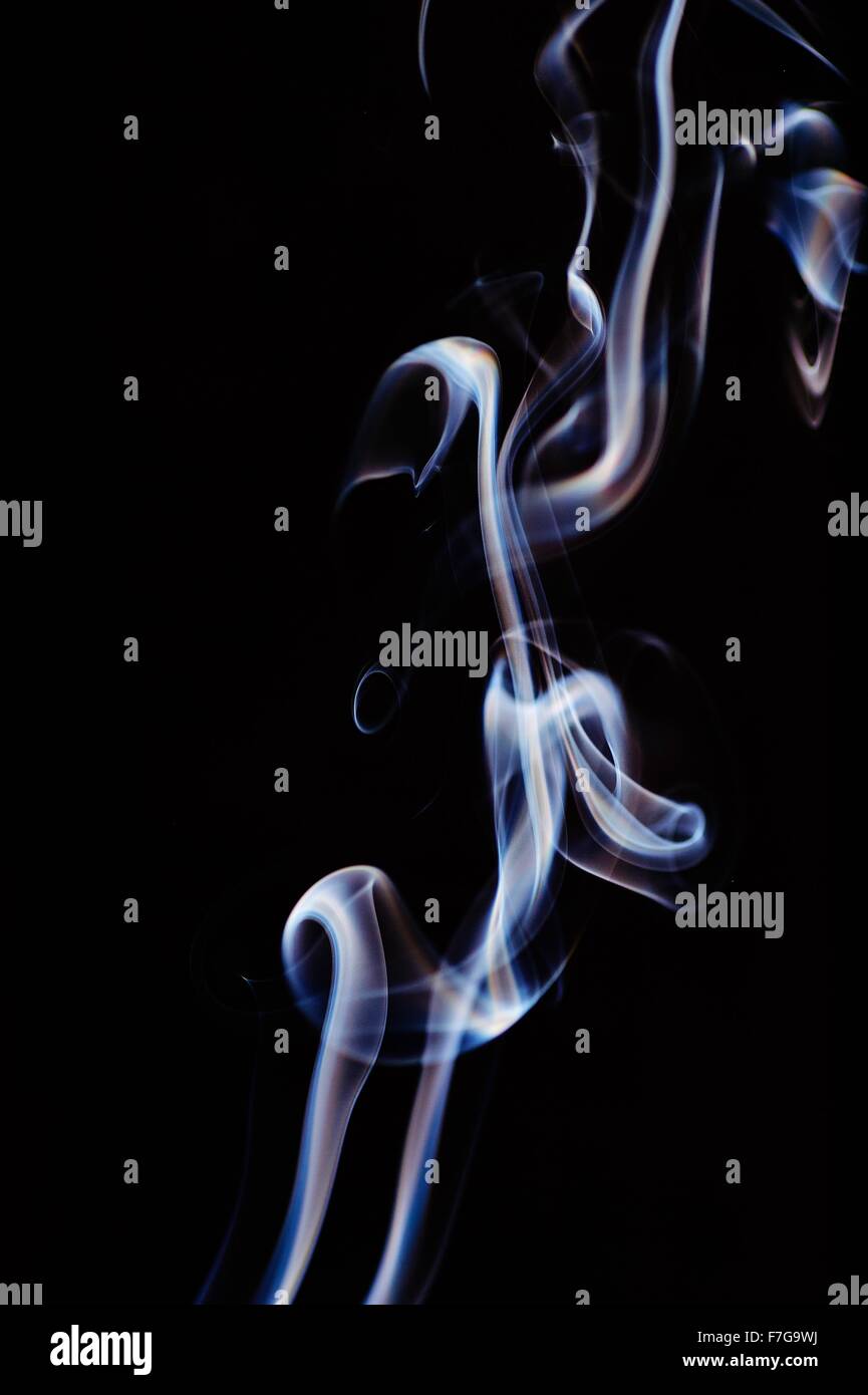 A studio photo of a insense candle smoke Stock Photo - Alamy