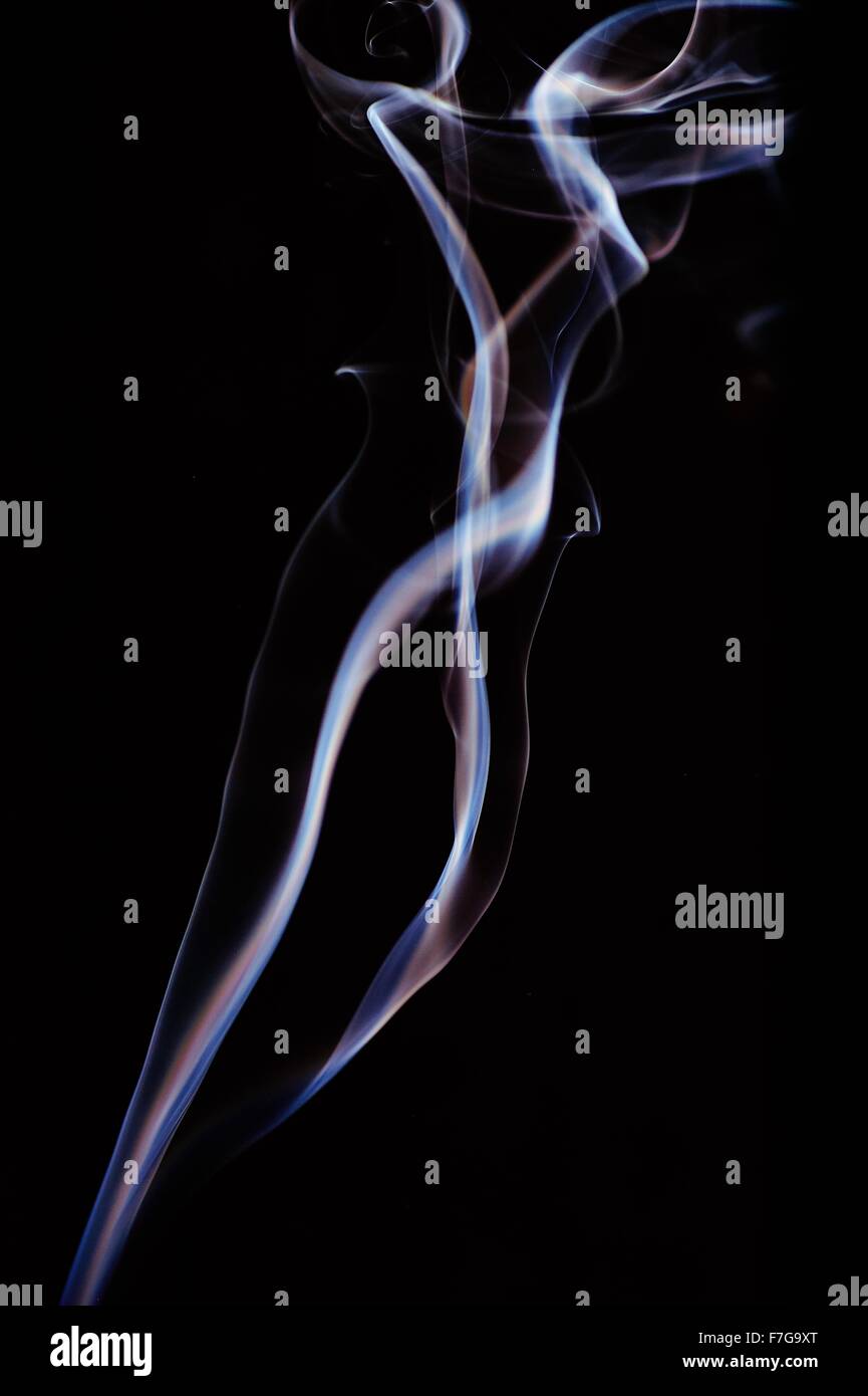 A studio photo of a insense candle smoke Stock Photo - Alamy
