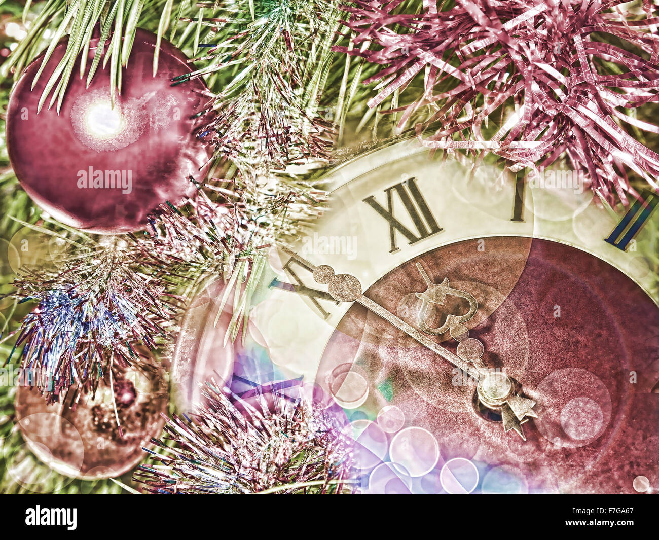 Eve of new year.Clock face and christmas balls.Toned image Stock Photo ...