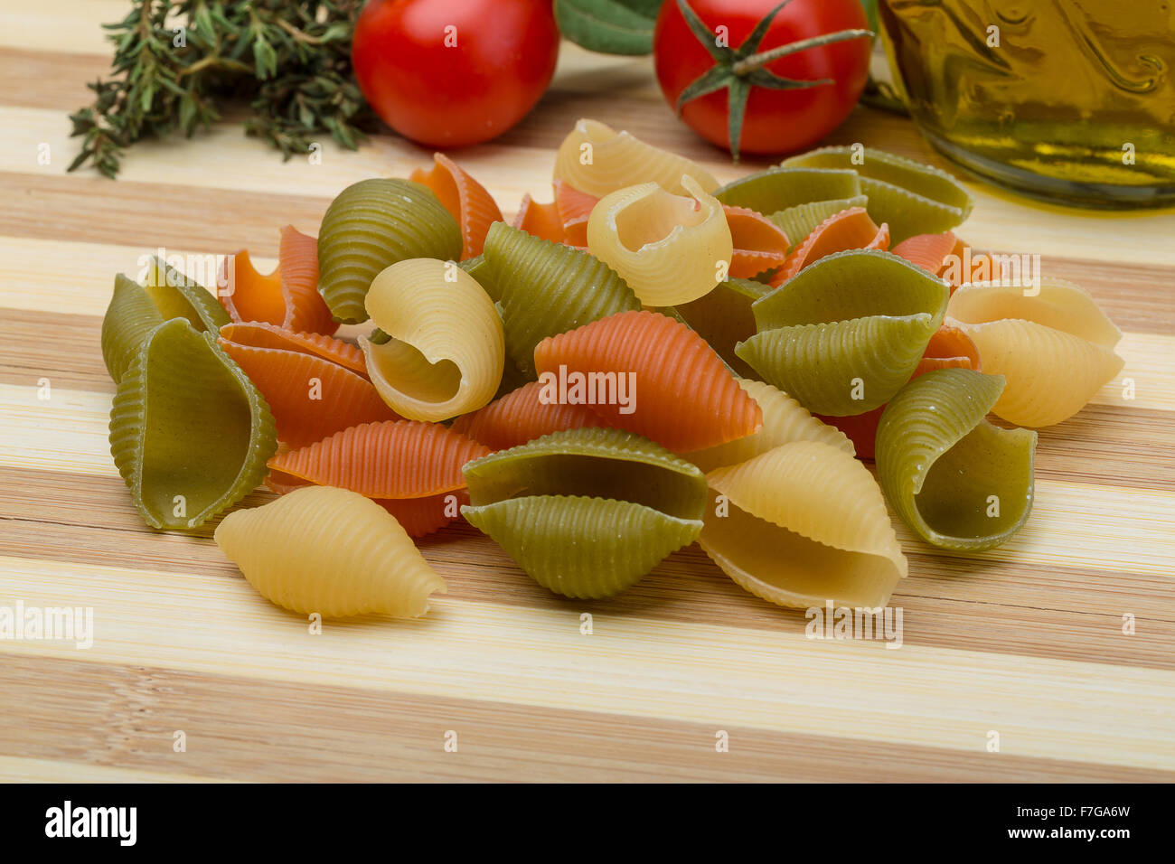 Pipe rigate pasta on the wood background Stock Photo - Alamy