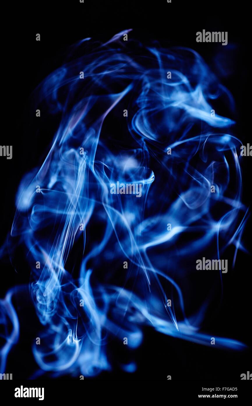 A studio photo of a insense candle smoke Stock Photo - Alamy