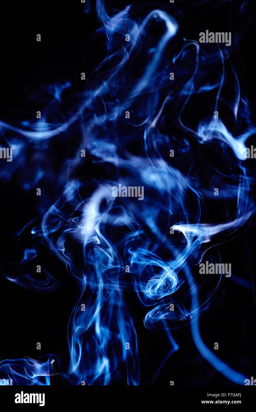 A studio photo of a insense candle smoke Stock Photo - Alamy