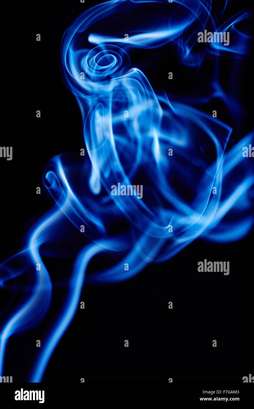 A studio photo of a insense candle smoke Stock Photo - Alamy