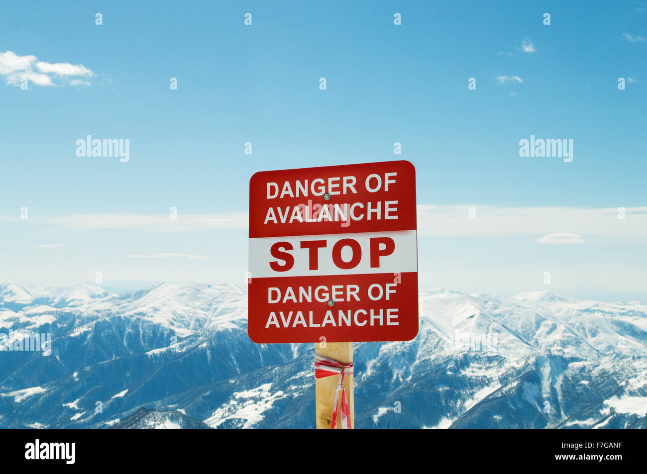 Avalanche sign and mountains at the background Stock Photo - Alamy