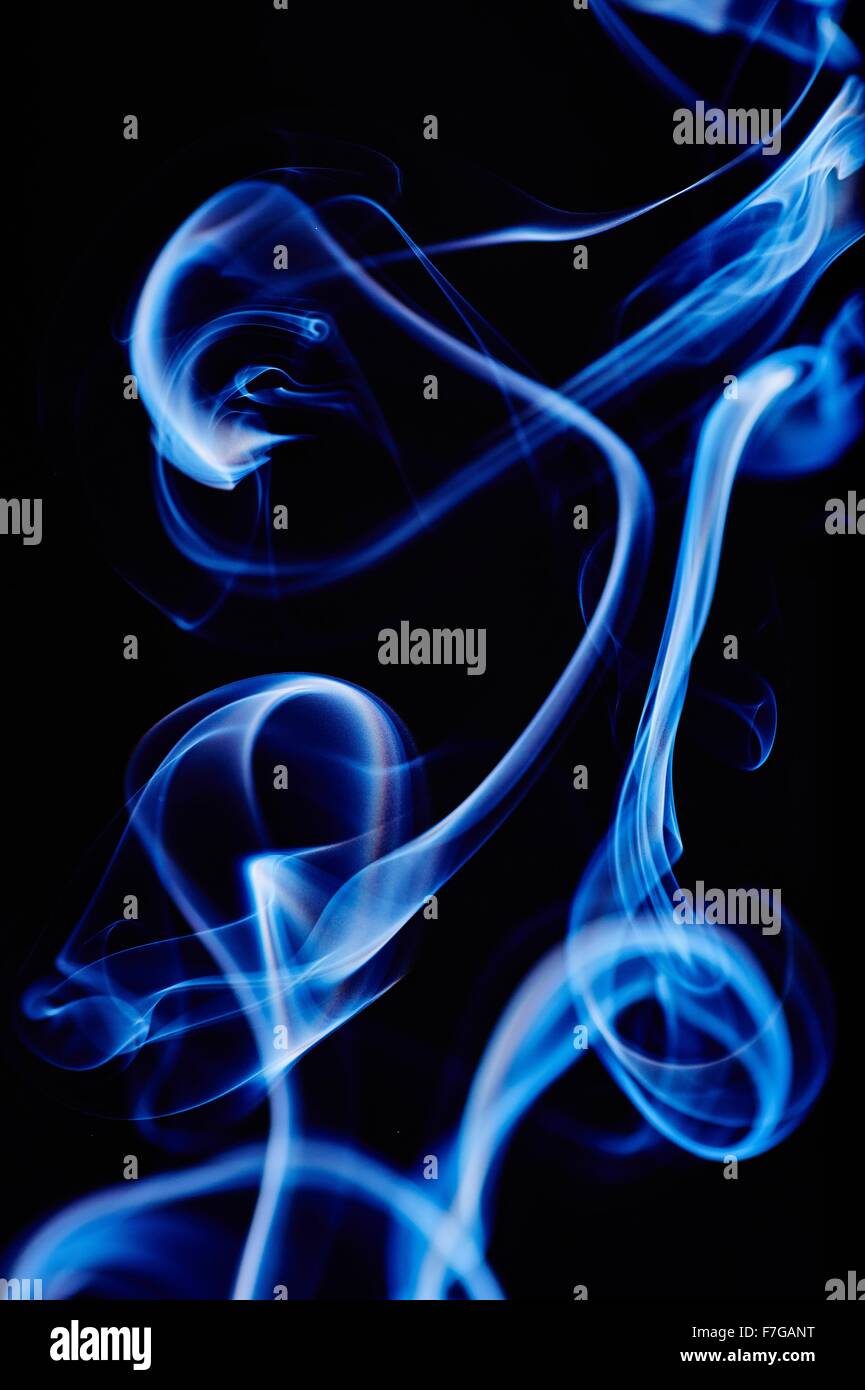 A studio photo of a insense candle smoke Stock Photo - Alamy