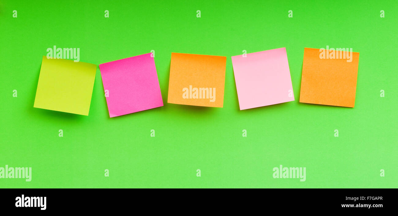 Reminder notes on the bright colorful paper Stock Photo - Alamy