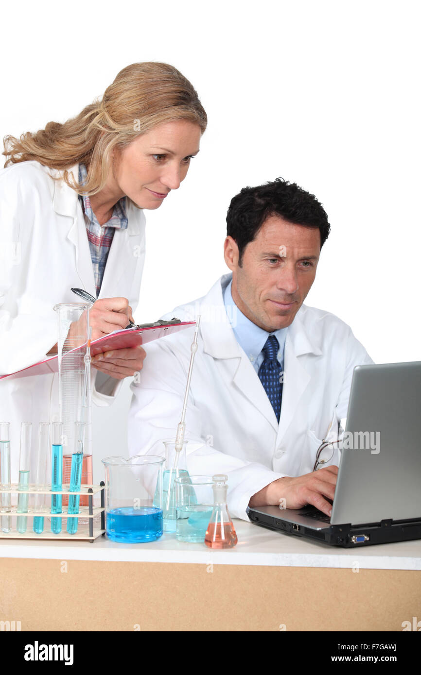 lab assistants on computer Stock Photo - Alamy