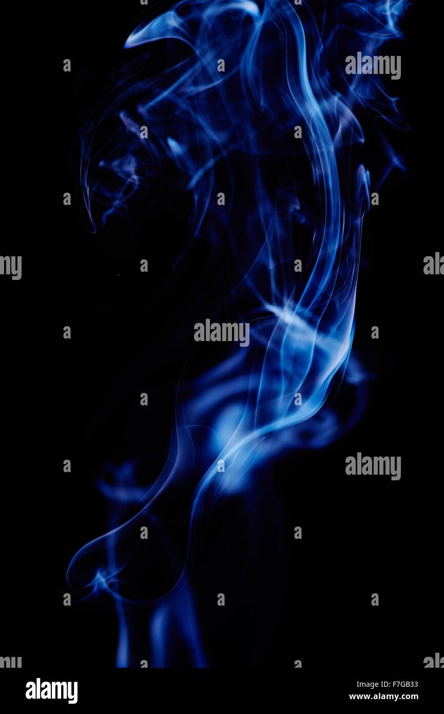 A studio photo of a insense candle smoke Stock Photo - Alamy