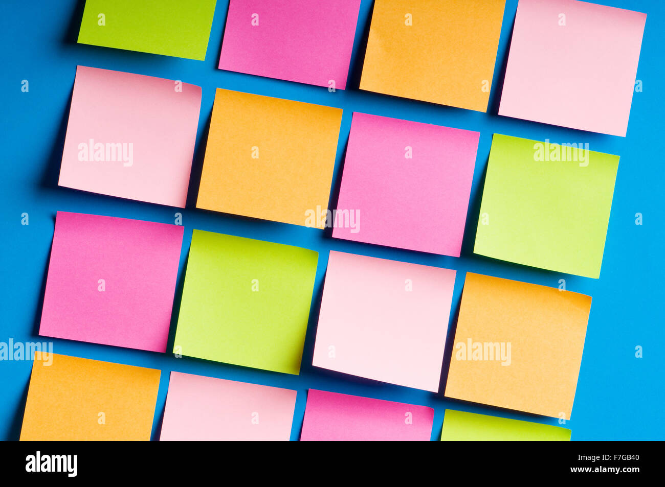 Reminder notes on the bright colorful paper Stock Photo - Alamy