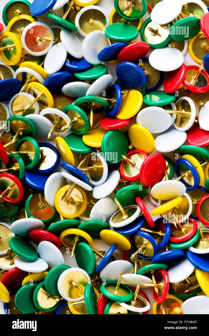 Many colourful office pins on the background Stock Photo - Alamy