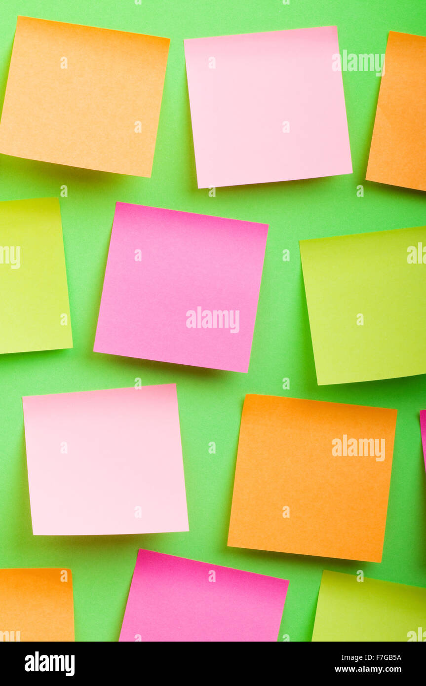 Reminder notes on the bright colorful paper Stock Photo - Alamy