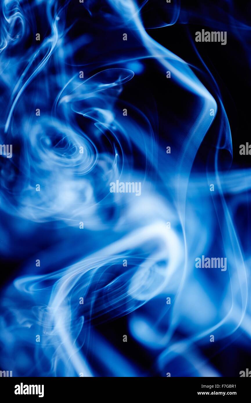 A studio photo of a insense candle smoke Stock Photo - Alamy
