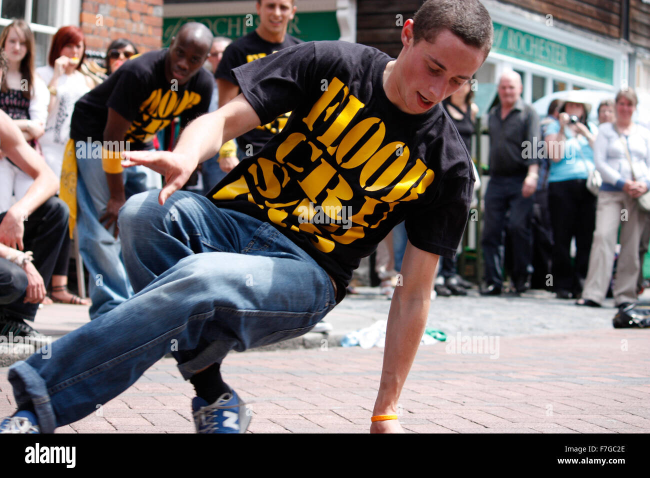 Street dancers performing in Rochester High Street, Kent Stock Photo ...